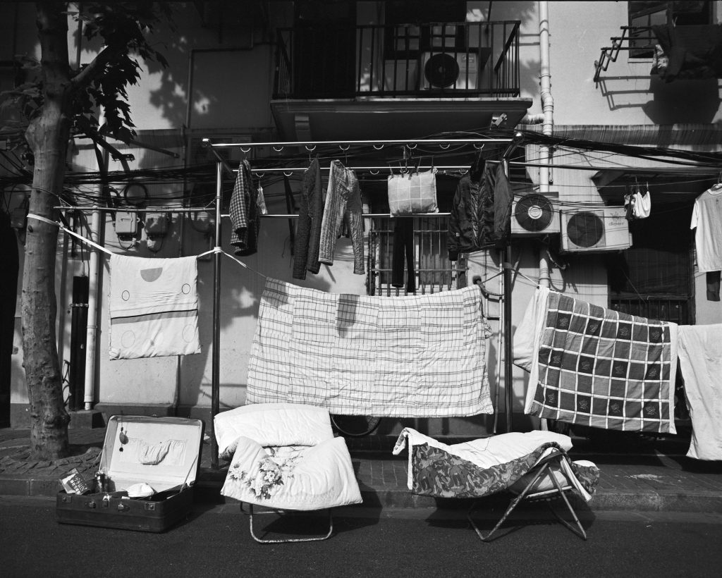 Sun drying bed wear - Exibart Street