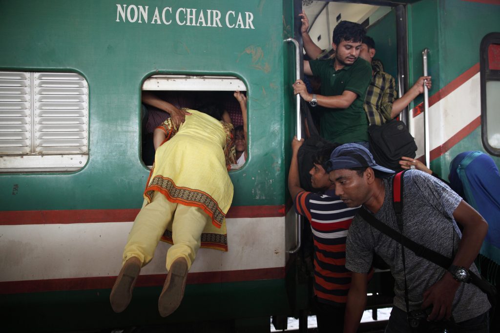 Passenger riding trains through the window for challenging journey-04 ...