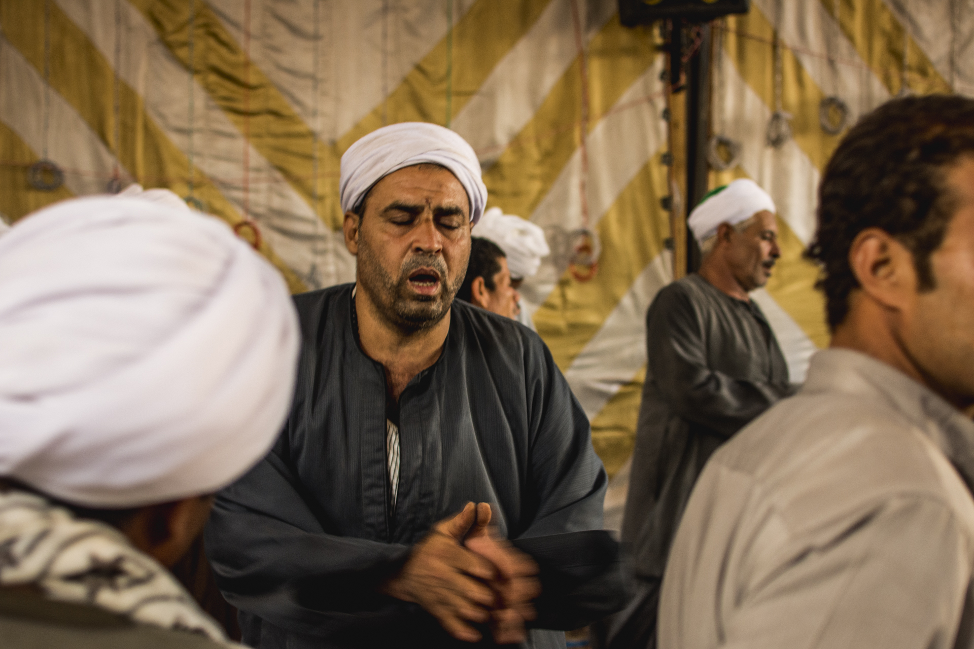 A man dance a sufi dance - Exibart Street
