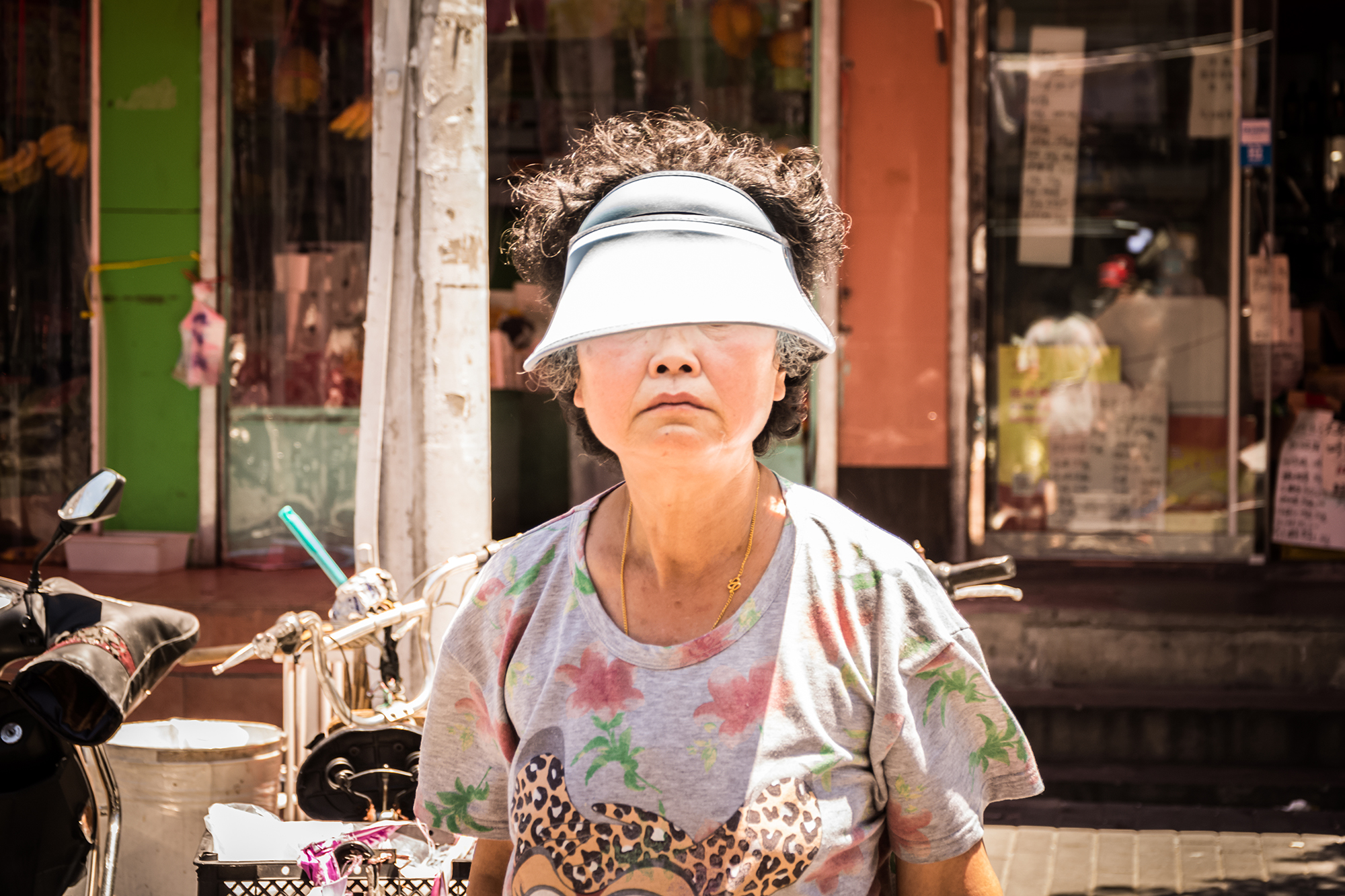 Lady with hut - Exibart Street